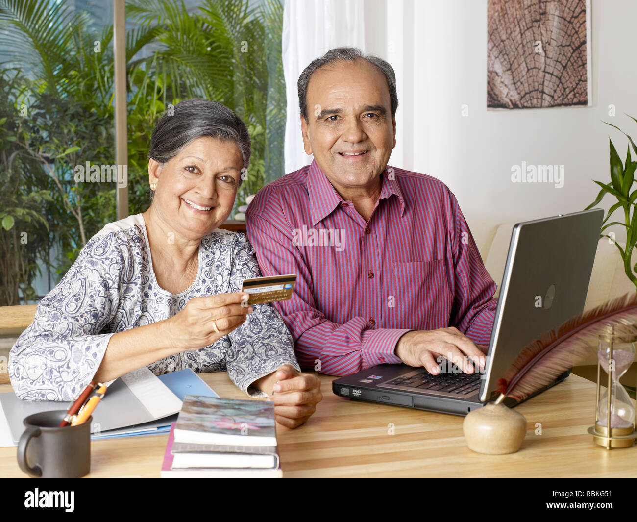 Old couple talking to their children hi-res stock photography and ...