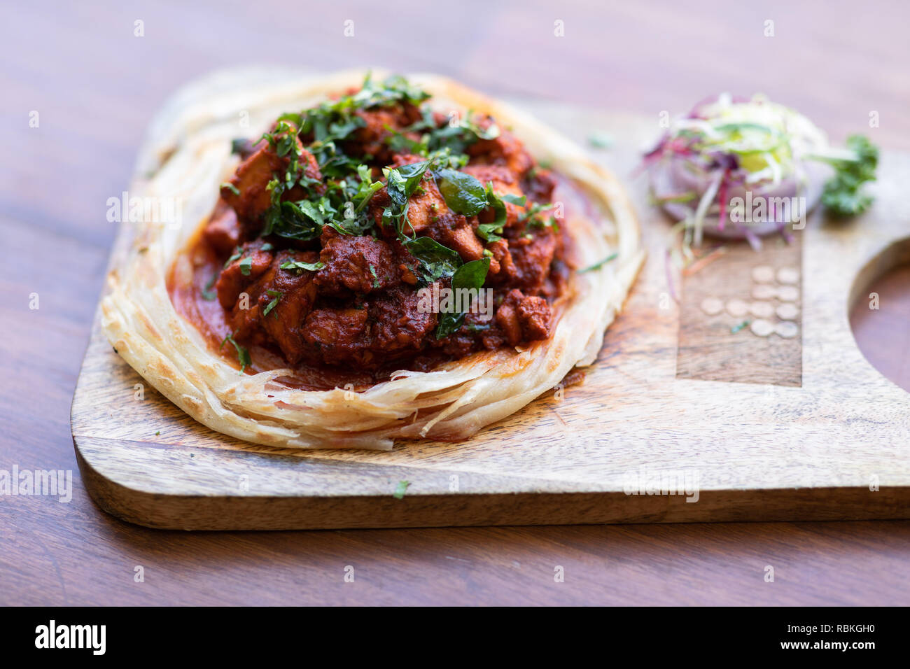 Morsel of Chicken leg boneless marinated with indian spices,chilli and ...