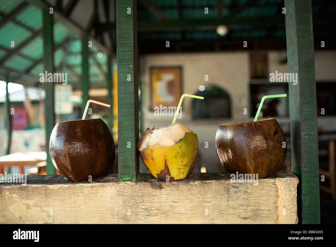 Coco Loco coctails (rum and coconut water) lined up in a coastal ...