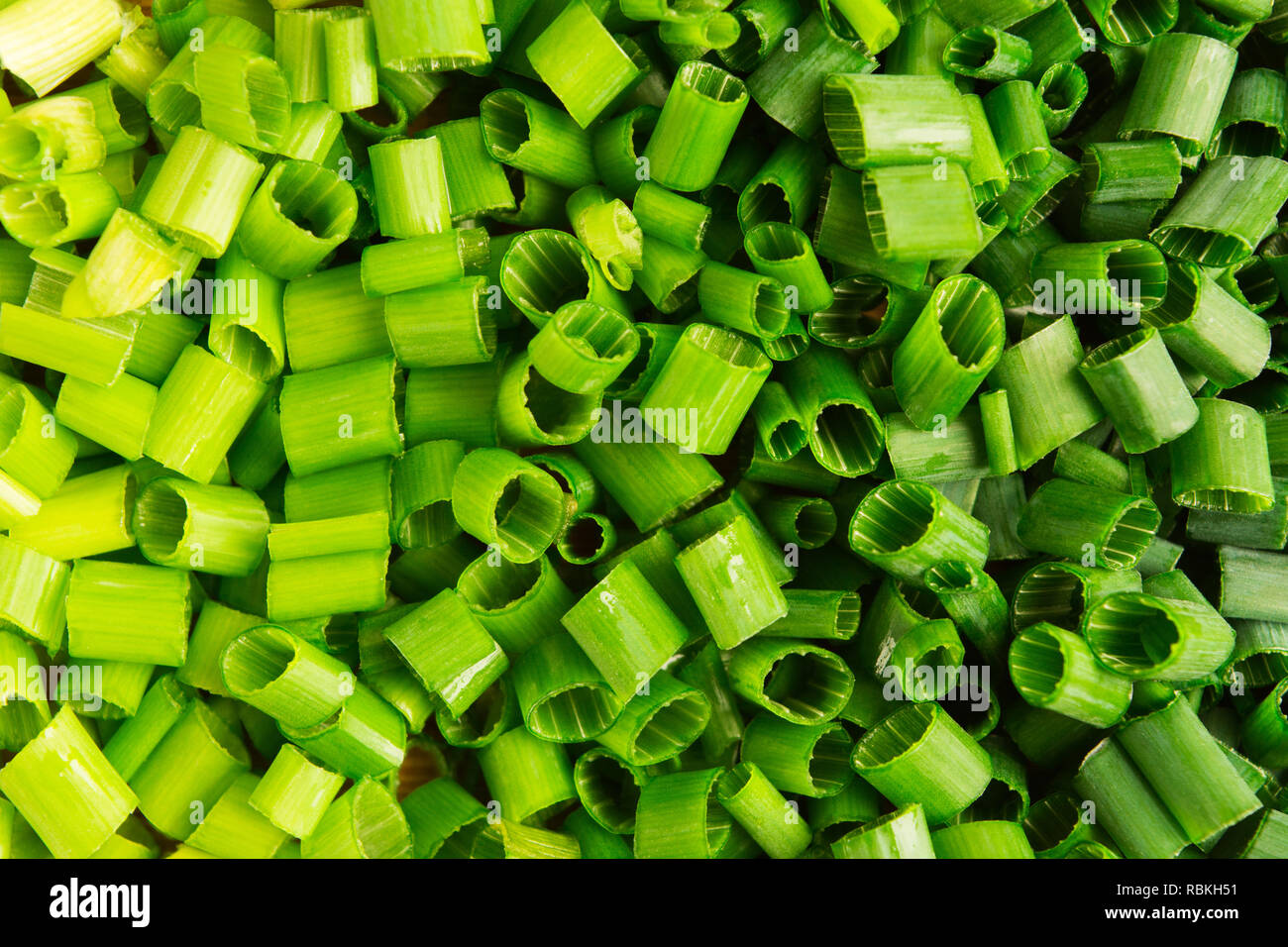 Chopped green spring onion color gradation texture background, top ...