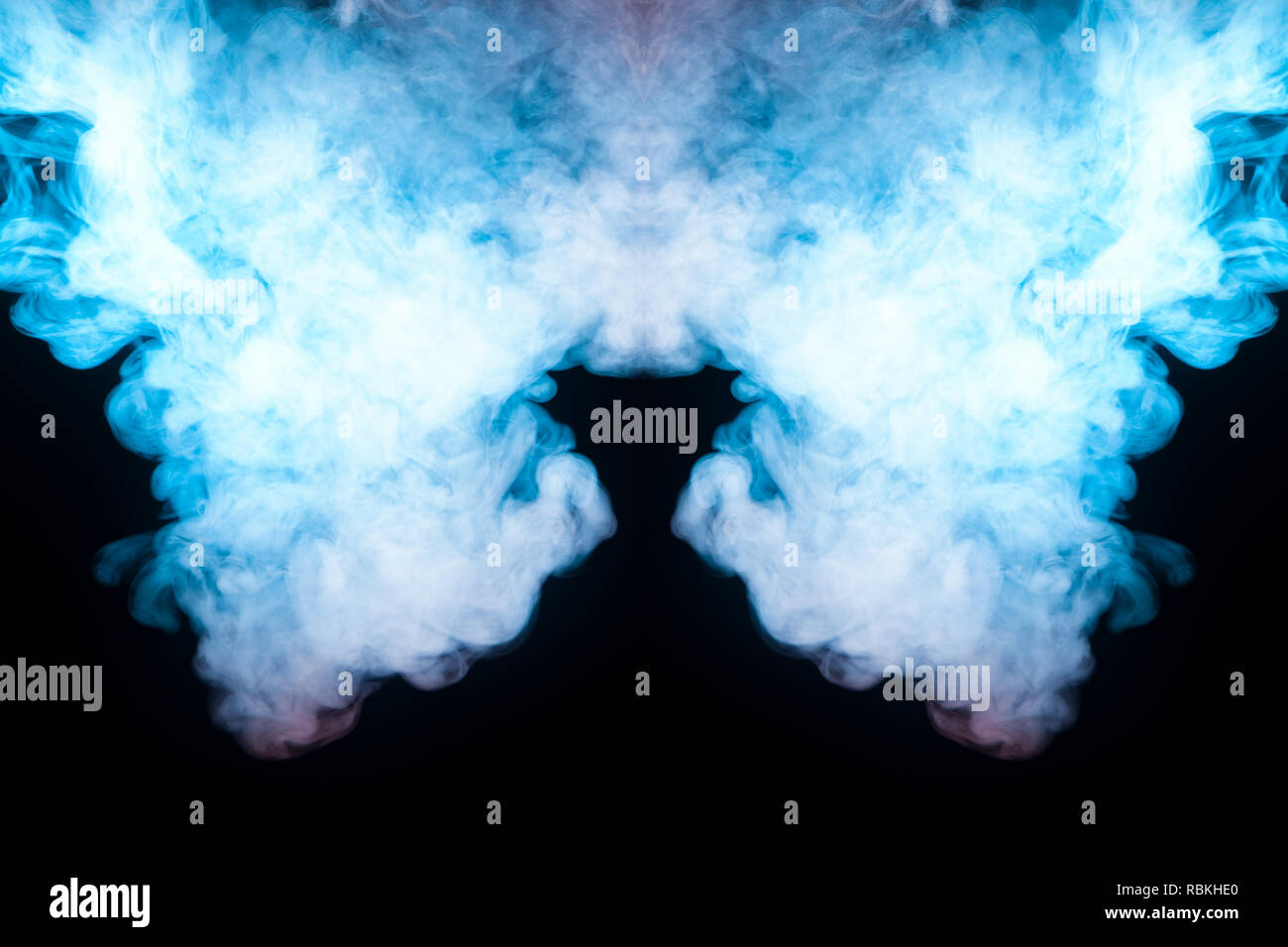 Background of blue wavy smoke in the shape of a jaw closeup on a black ...