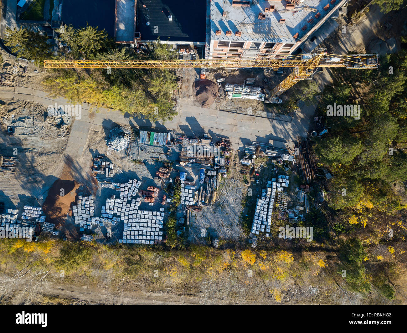 Aerial view of a building construction site at the place of storage of ...