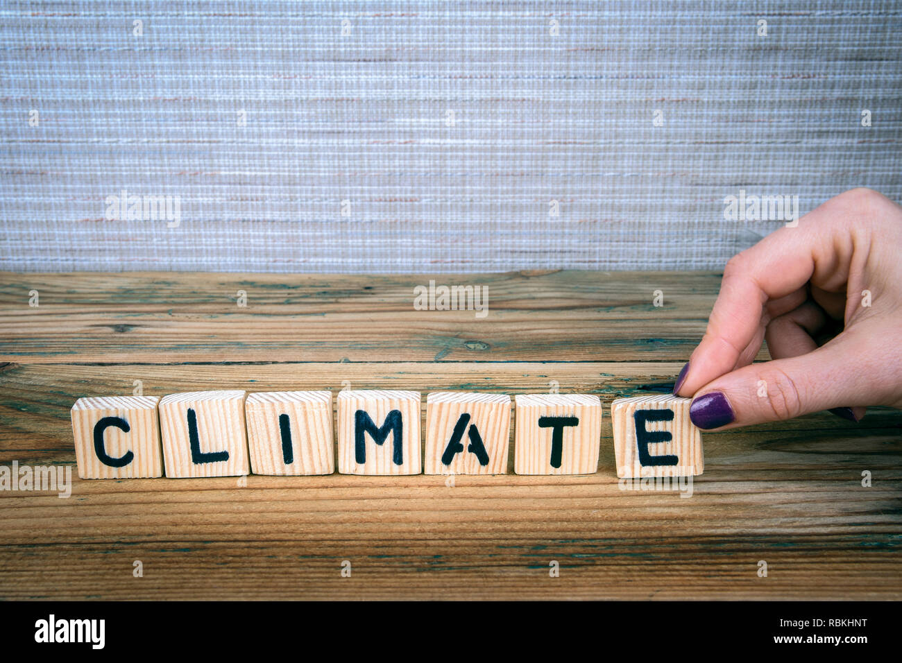climate. Wooden letters on the office desk Stock Photo - Alamy
