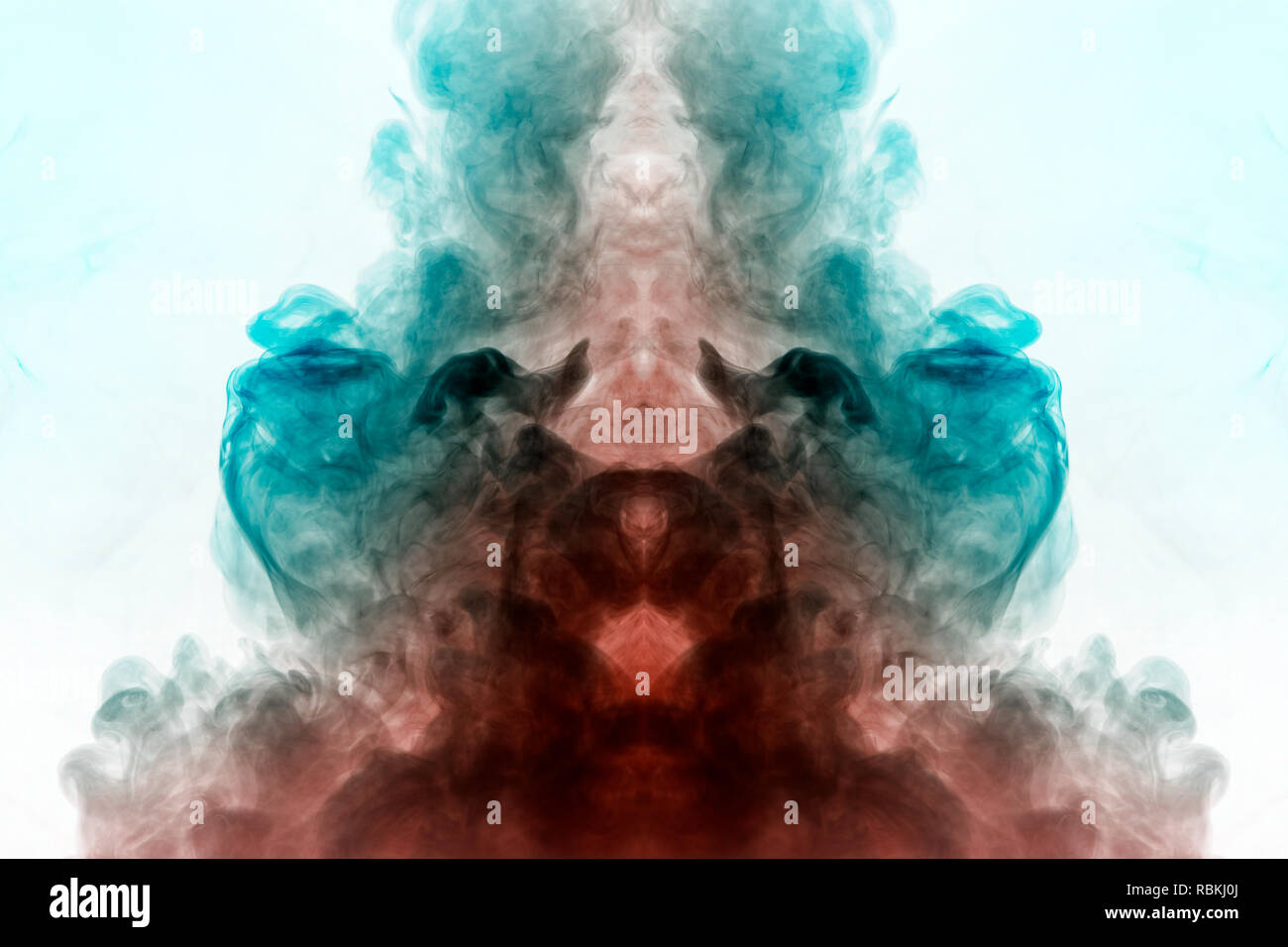 A multi-colored pattern of green and red smoke of a mystical shape in ...