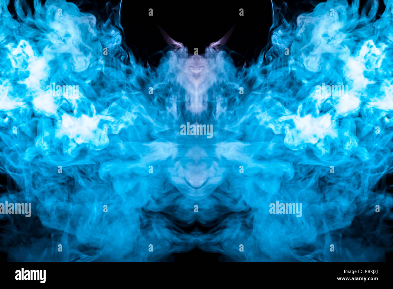 A multi-colored pattern of blue smoke of a mystical shape in the form ...