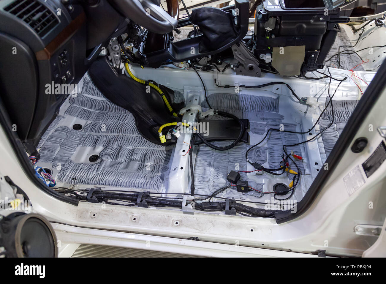 The front part is inside the body of the white crossover on the driver ...