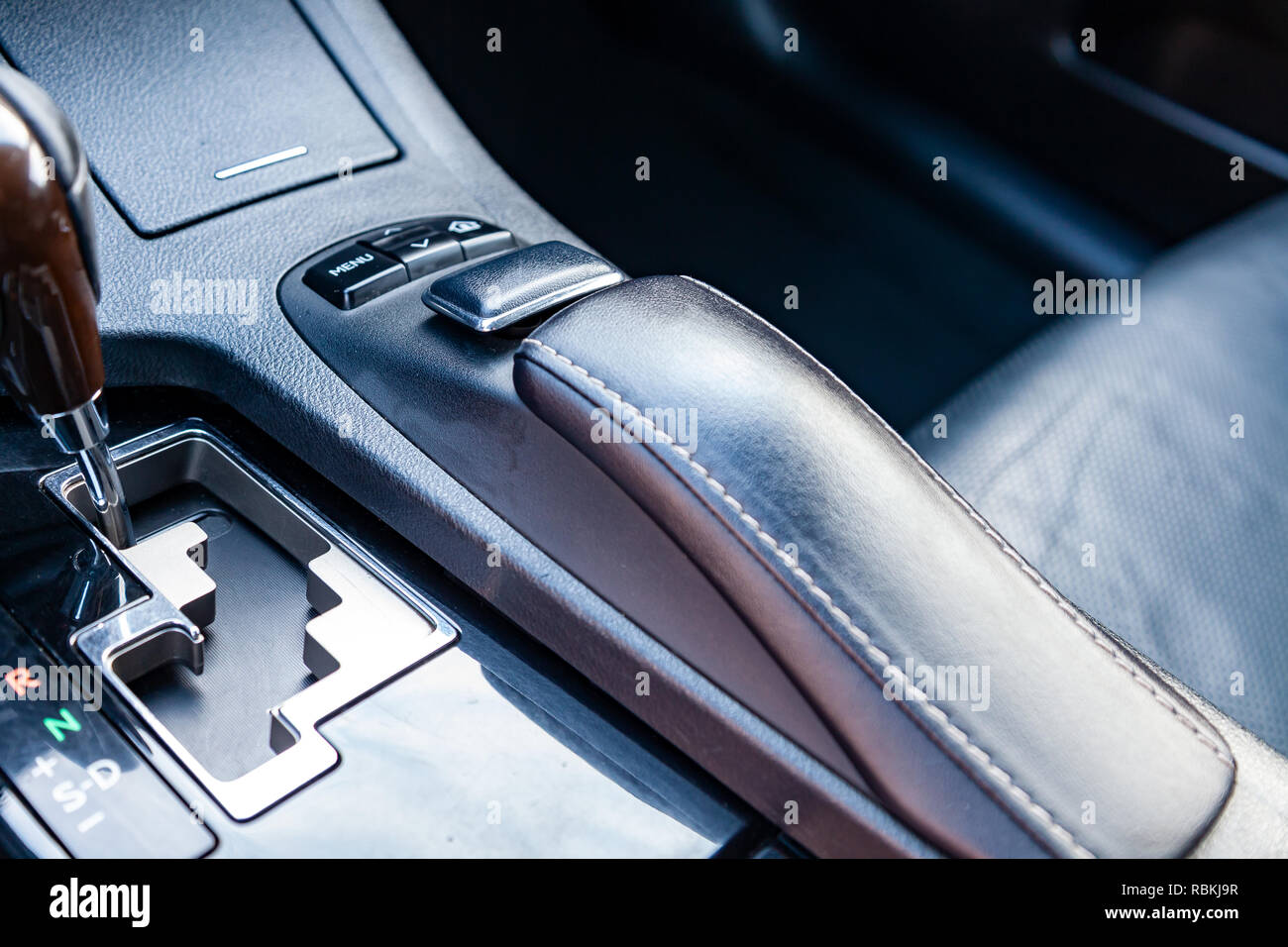 Multimedia system with control buttons and gearshift lever close-up on ...