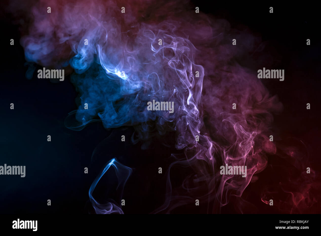 Cosmic evaporating smoke, swirling pillar illuminated by light on a ...