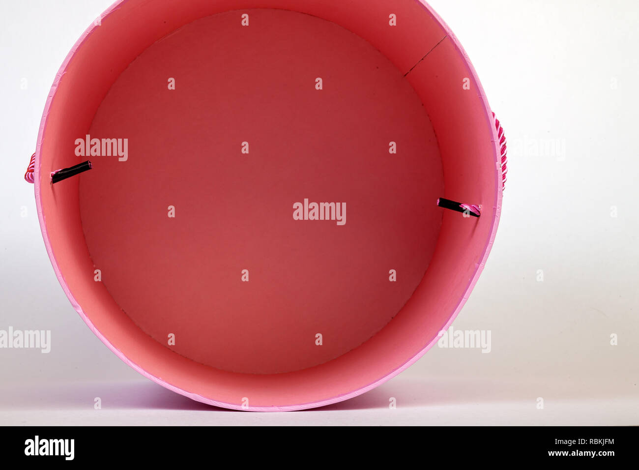 Top view of a pink pink round cardboard box empty inside for gift ...