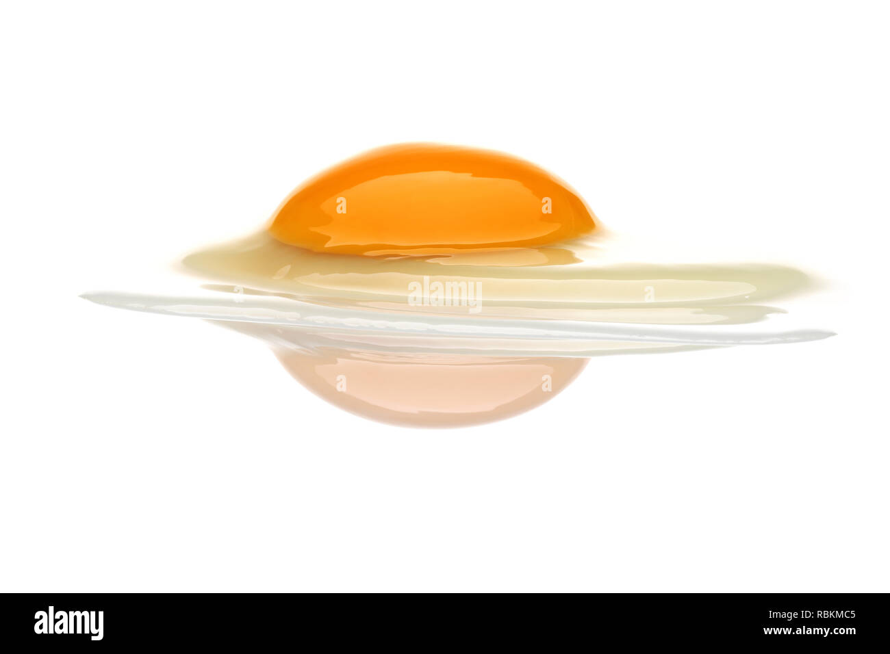 Broken egg isolated on white background Stock Photo - Alamy