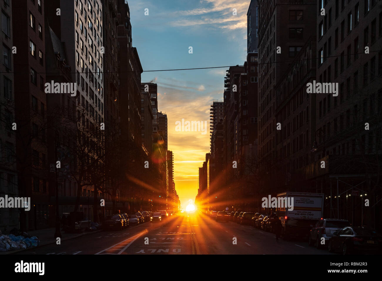New York, USA. 11th Jan 2019. The rising sun is seen from Manhattan ...