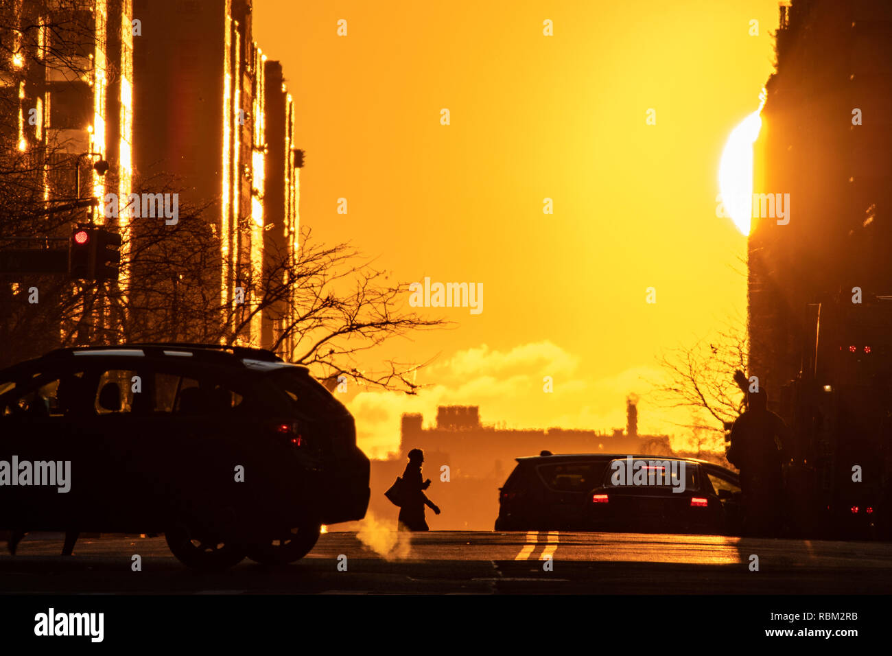 New York, USA. 11th Jan 2019. The rising sun is seen from Manhattan ...