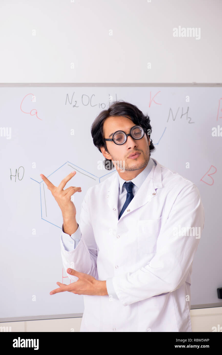 Scientist standing in front whiteboard hi-res stock photography and ...
