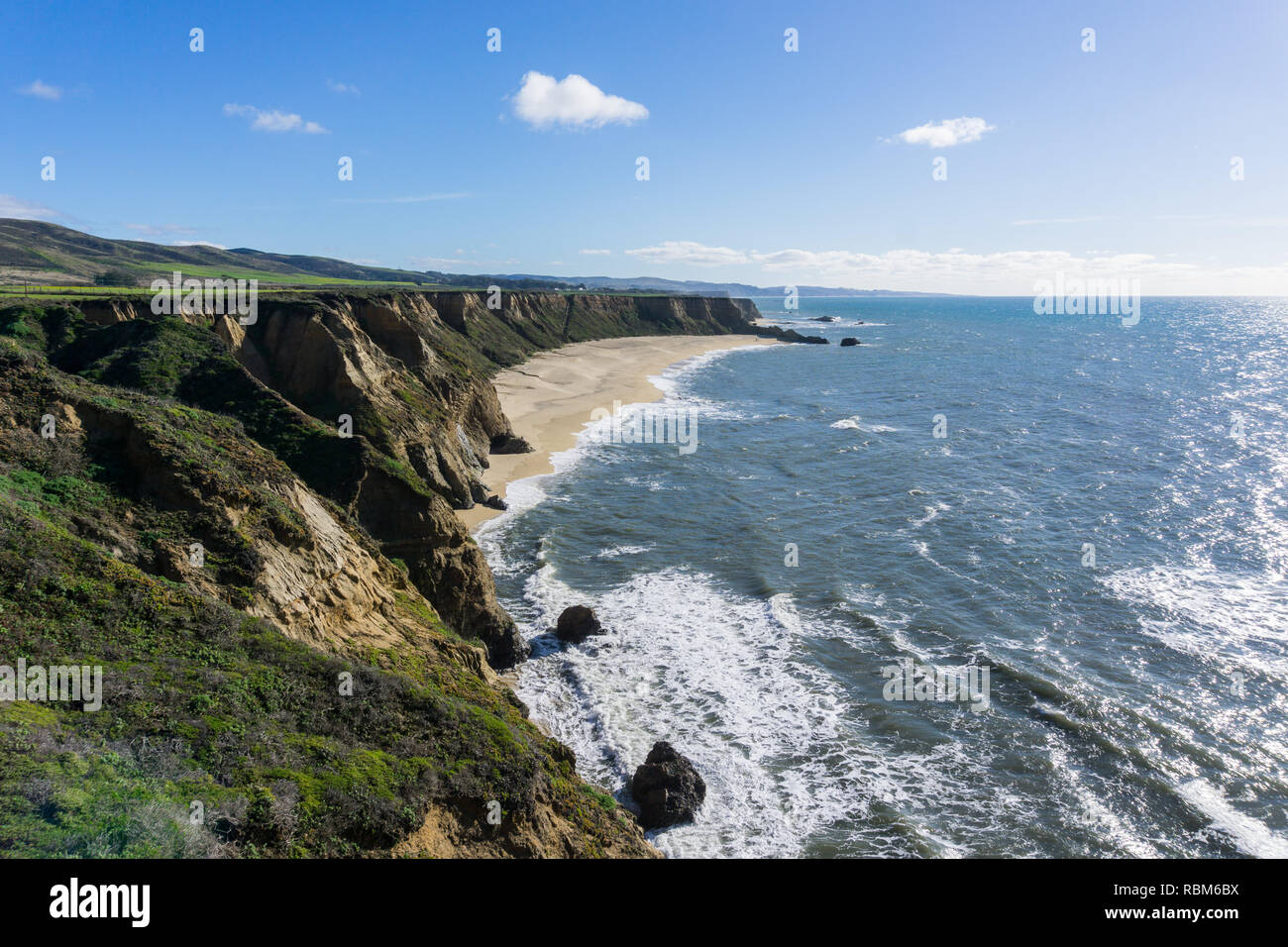 Cliffs and large half moon shaped beach, Pacific Ocean Coast, Half Moon ...