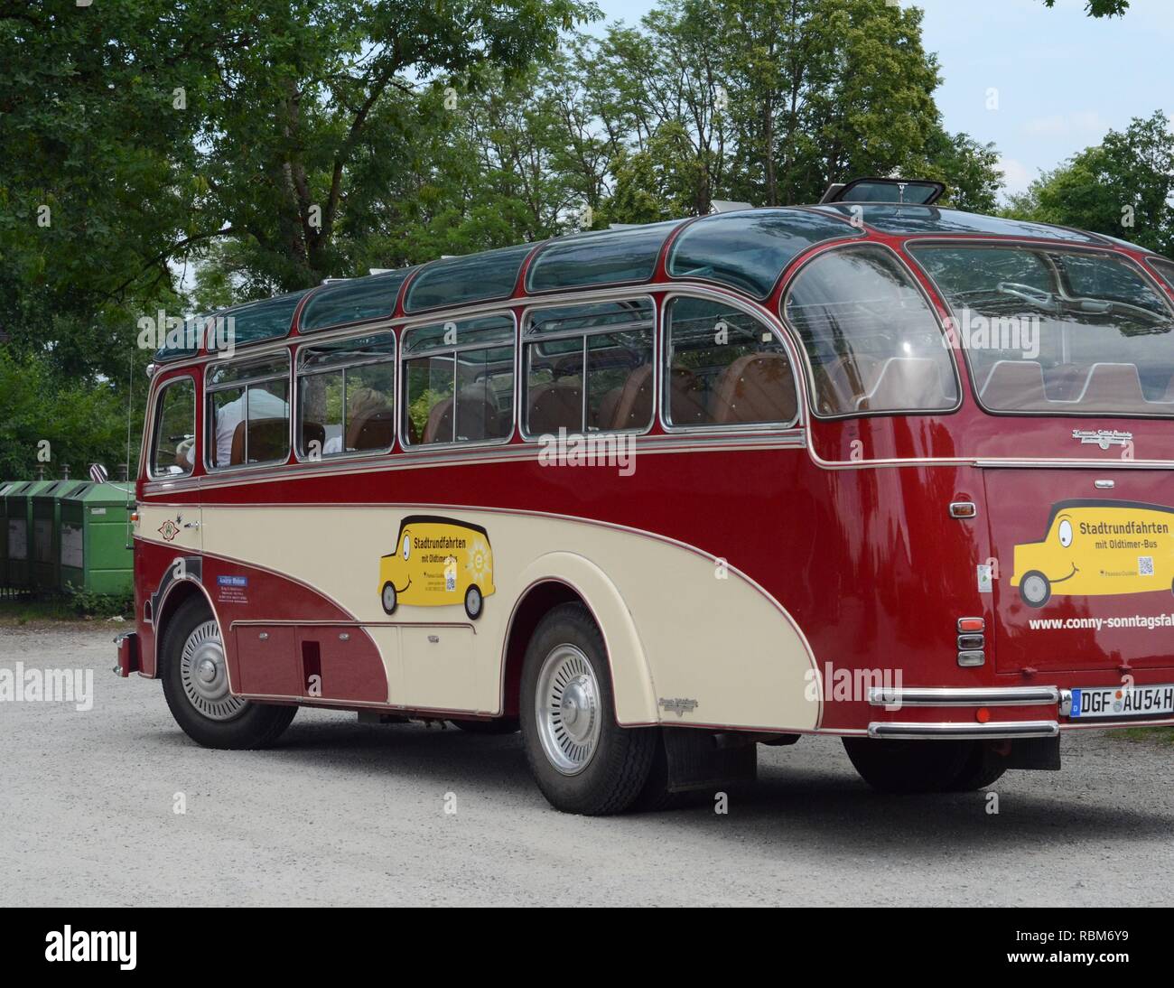 A vintage red tour bus near Passau, Germany Stock Photo - Alamy