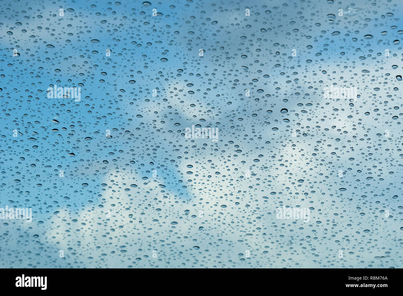 Raindrops on windshield storm clouds hi-res stock photography and ...
