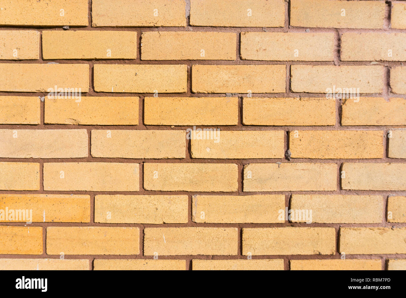Orange brick wall Stock Photo - Alamy