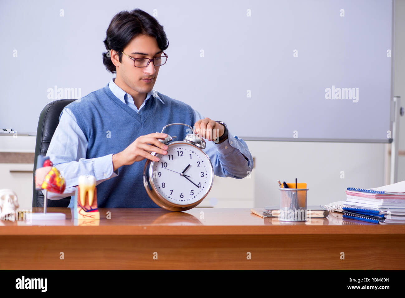 Young lecturer teacher teaching anatomy Stock Photo - Alamy