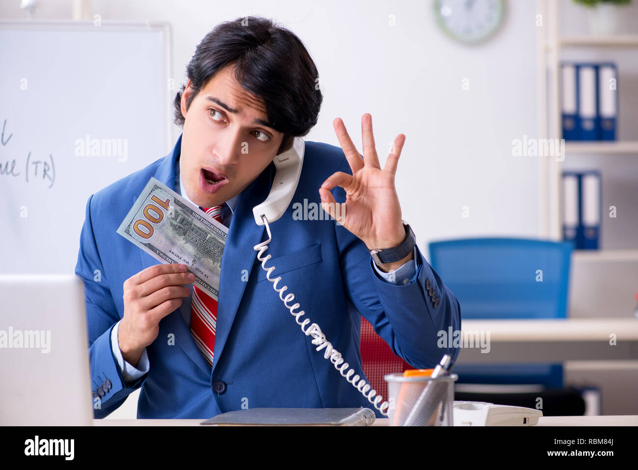 Busy businessman explaining business charts Stock Photo - Alamy
