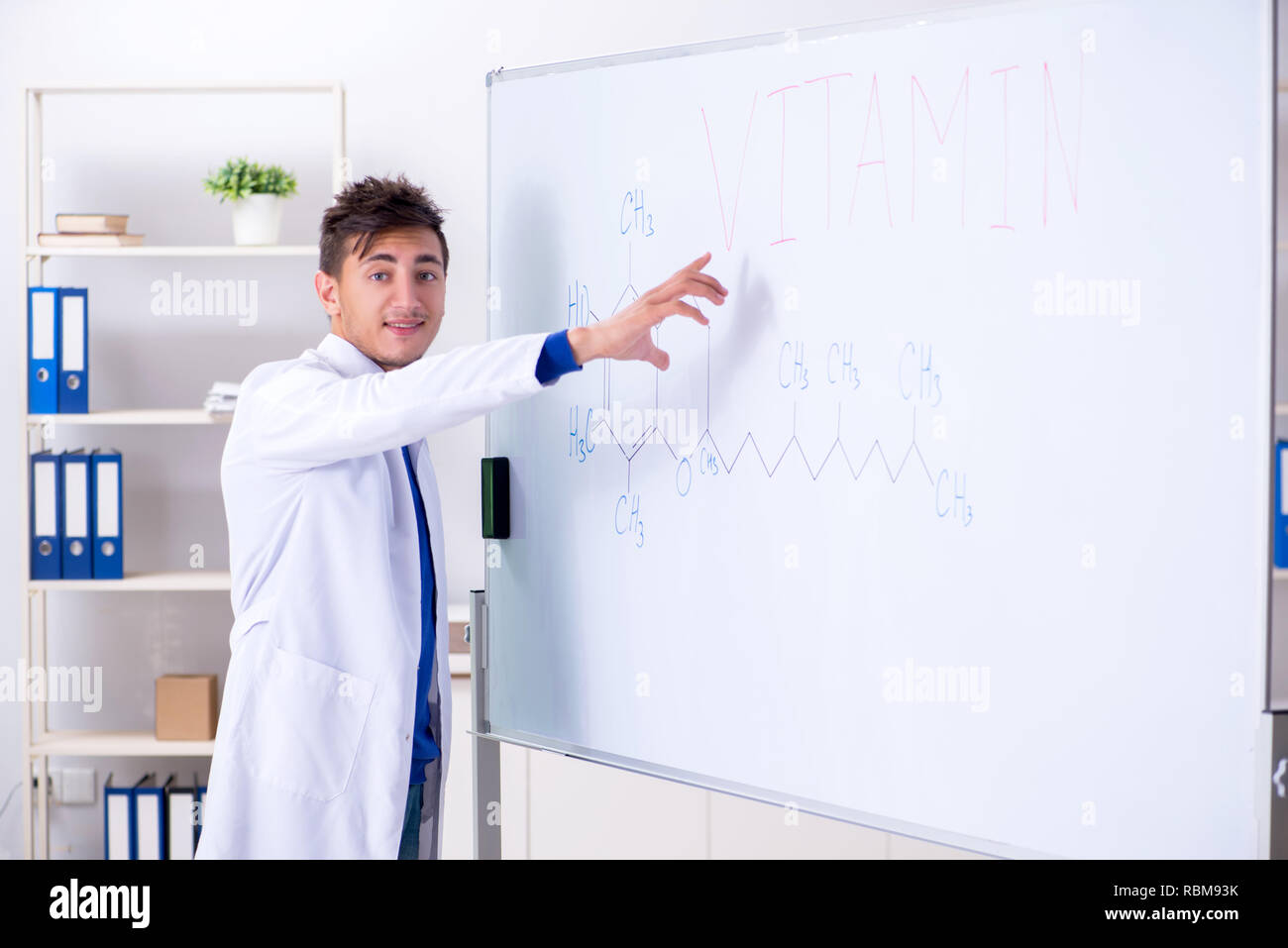 Scientist standing in front whiteboard hi-res stock photography and ...