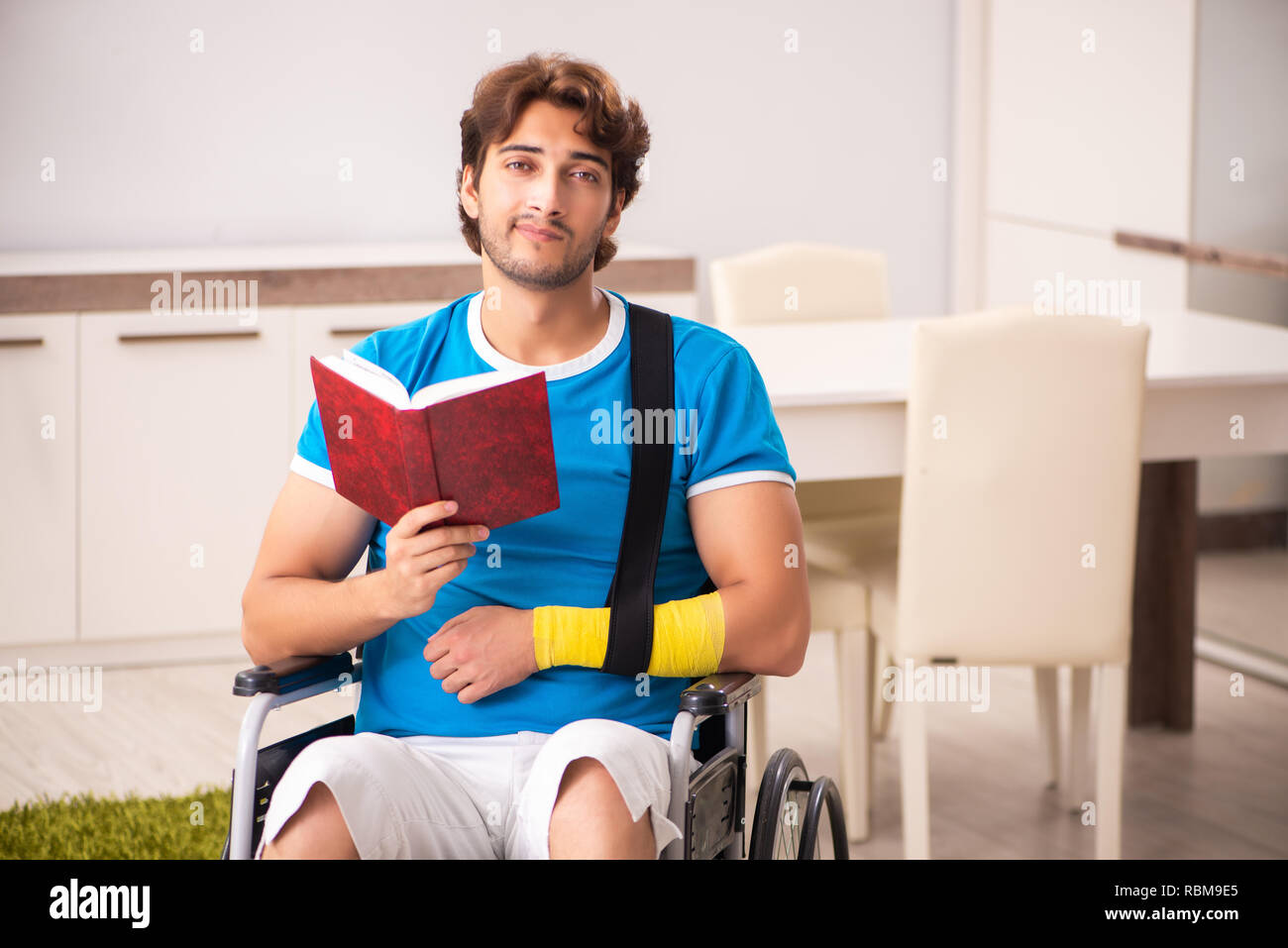 Injured man recovering from his injury Stock Photo - Alamy