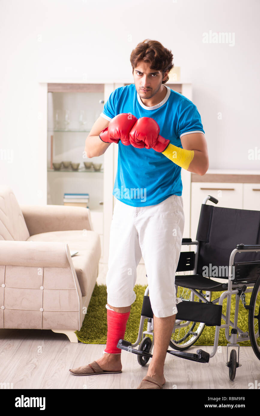Injured man recovering from his injury Stock Photo - Alamy