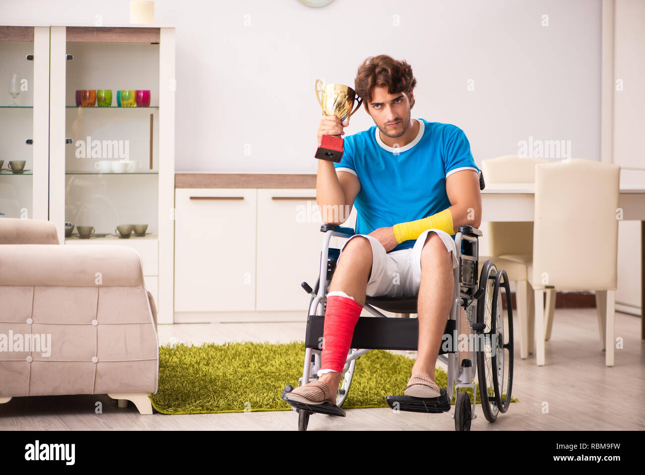Injured man recovering from his injury Stock Photo - Alamy