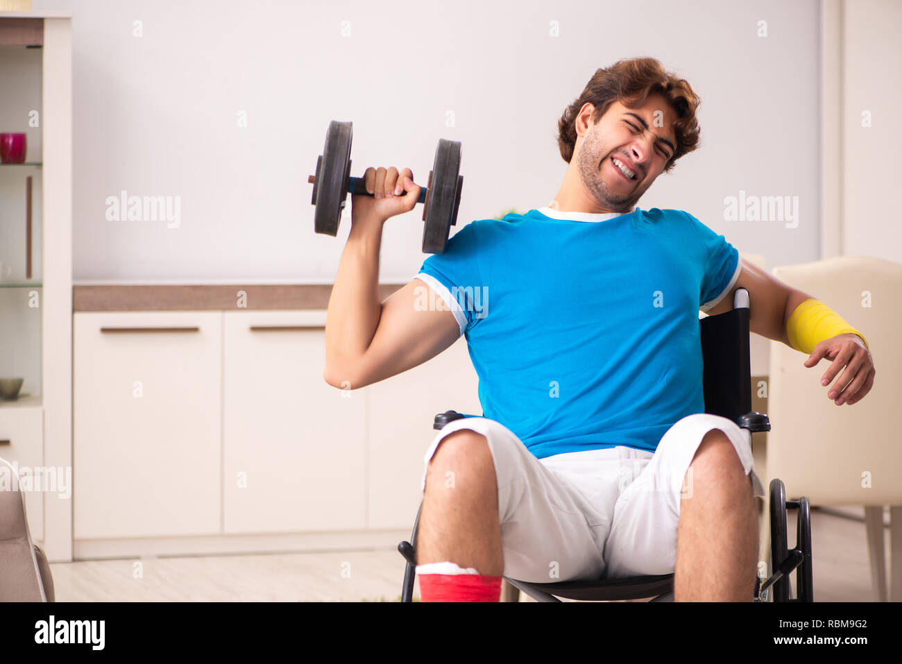 Strong man lifting car hi-res stock photography and images - Alamy