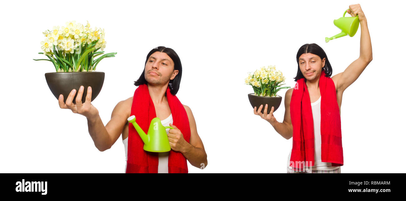 Young man watering flowers isolated on white Stock Photo - Alamy