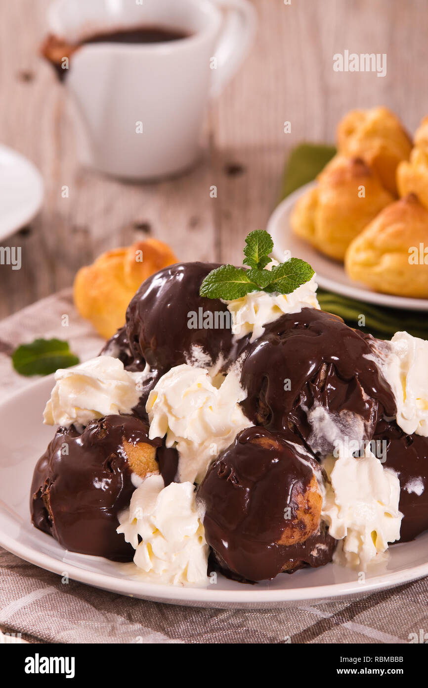 Chocolate profiteroles hi-res stock photography and images - Alamy