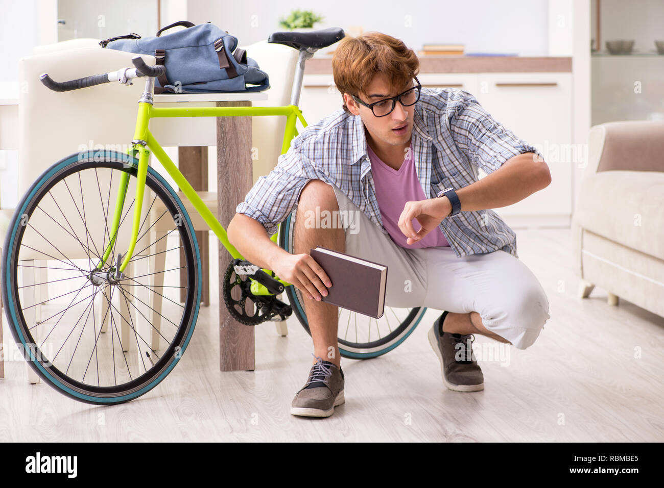 Student commuting to university using cycle Stock Photo - Alamy