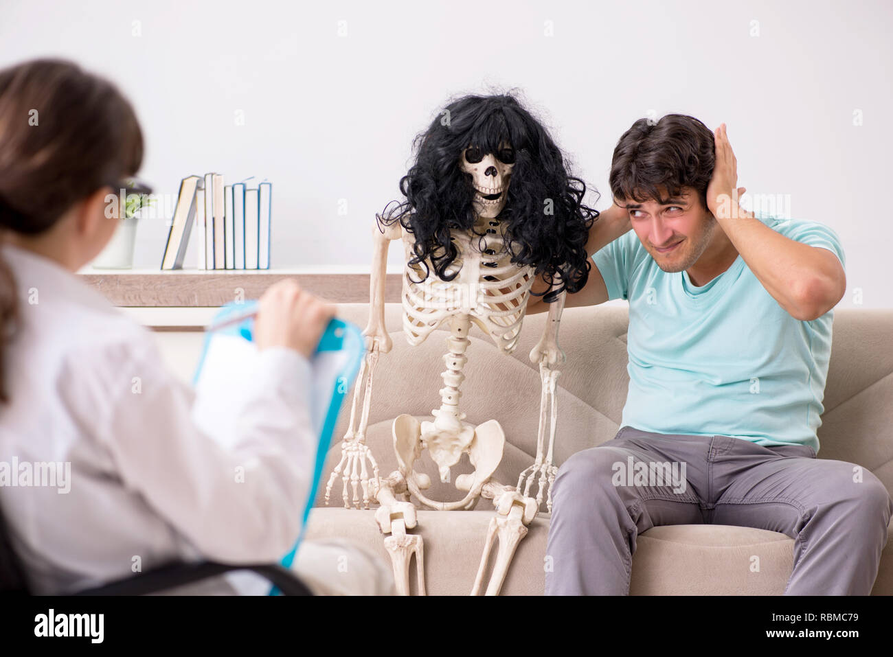 Young patient visiting psychologist for therapy Stock Photo - Alamy