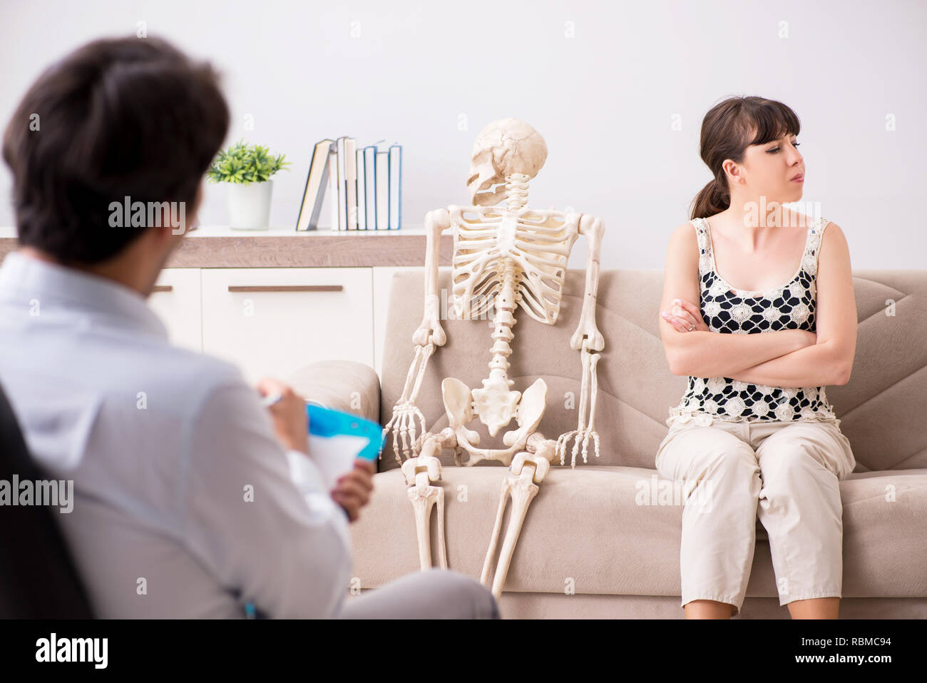 Young patient visiting psychologist for therapy Stock Photo - Alamy