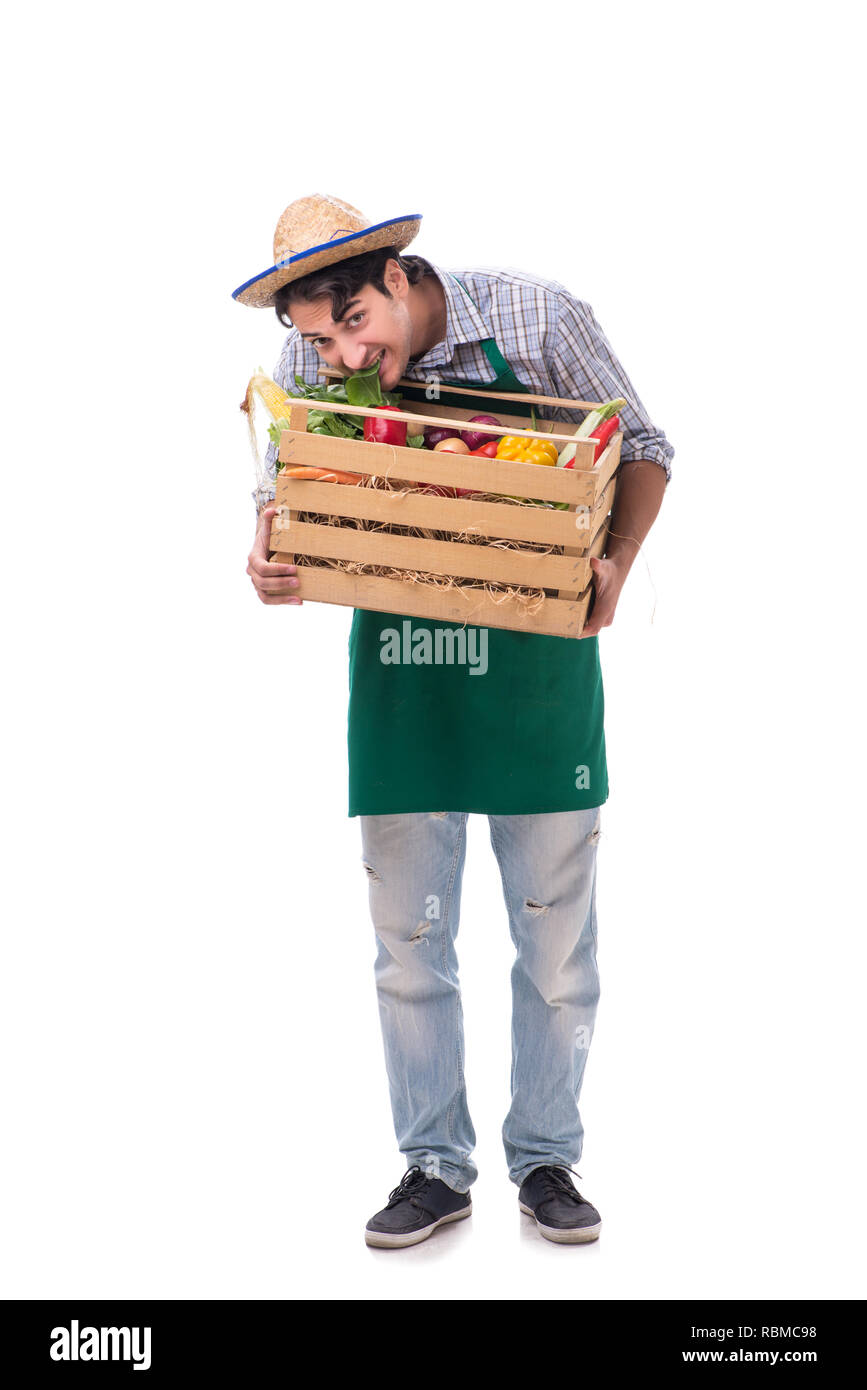 Young farmer with fresh produce isolated on white background Stock ...