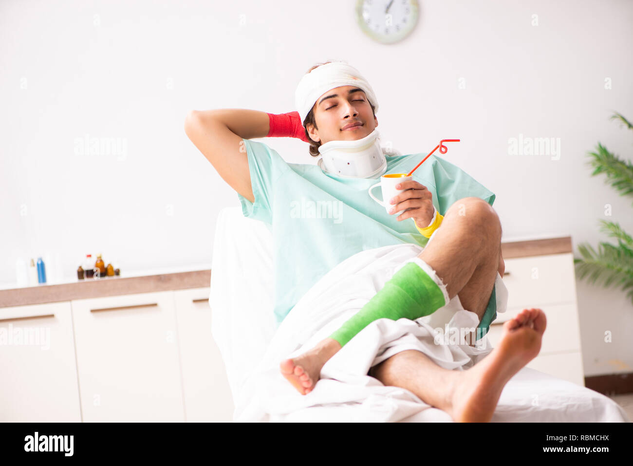 Young injured man staying in the hospital Stock Photo - Alamy