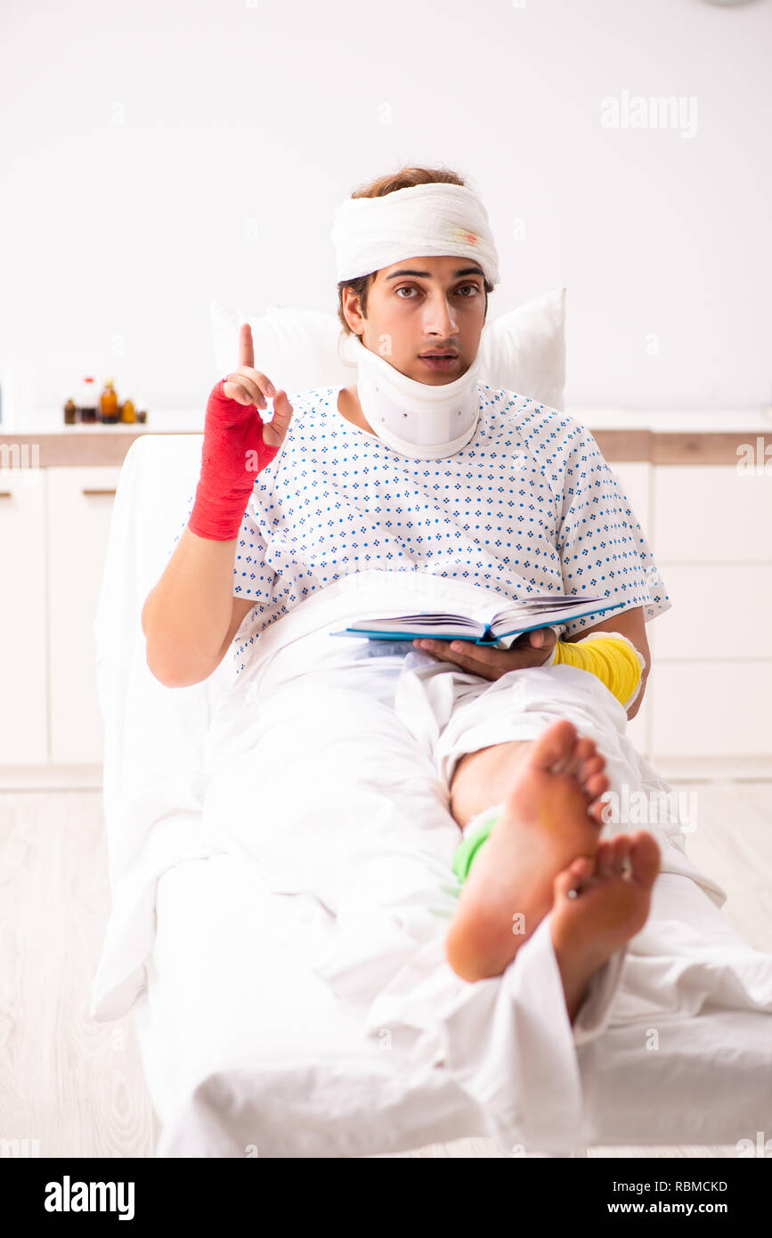 Young injured man staying in the hospital Stock Photo - Alamy