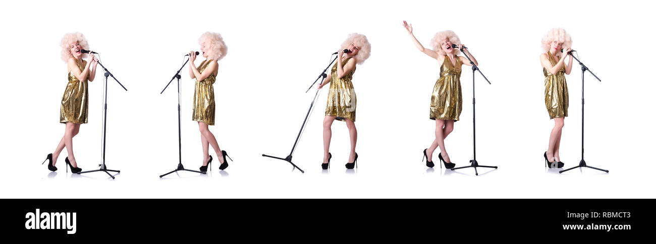 Pop star with mic on white Stock Photo - Alamy