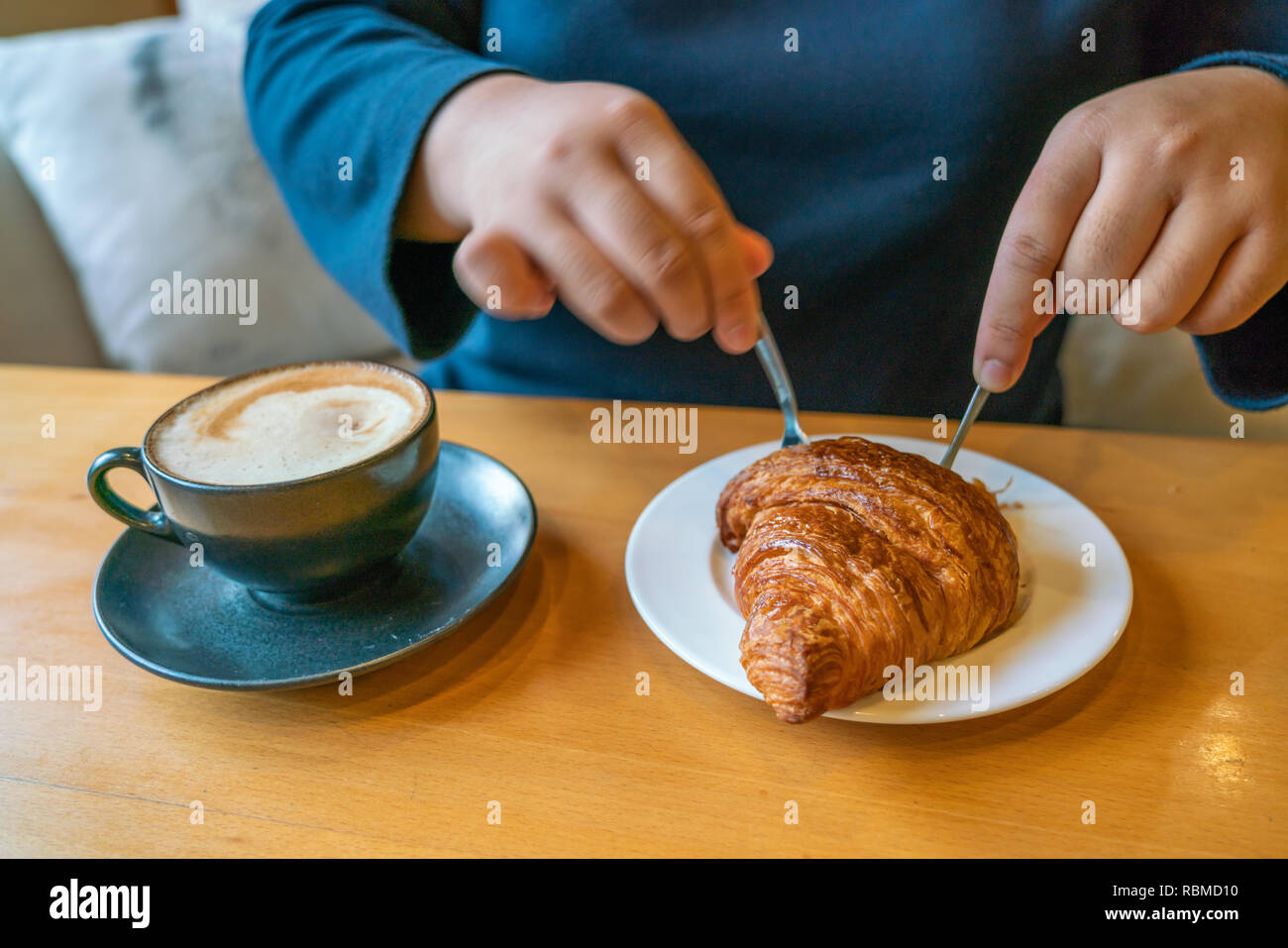 Woman tasty croissant sandwich hi-res stock photography and images - Alamy