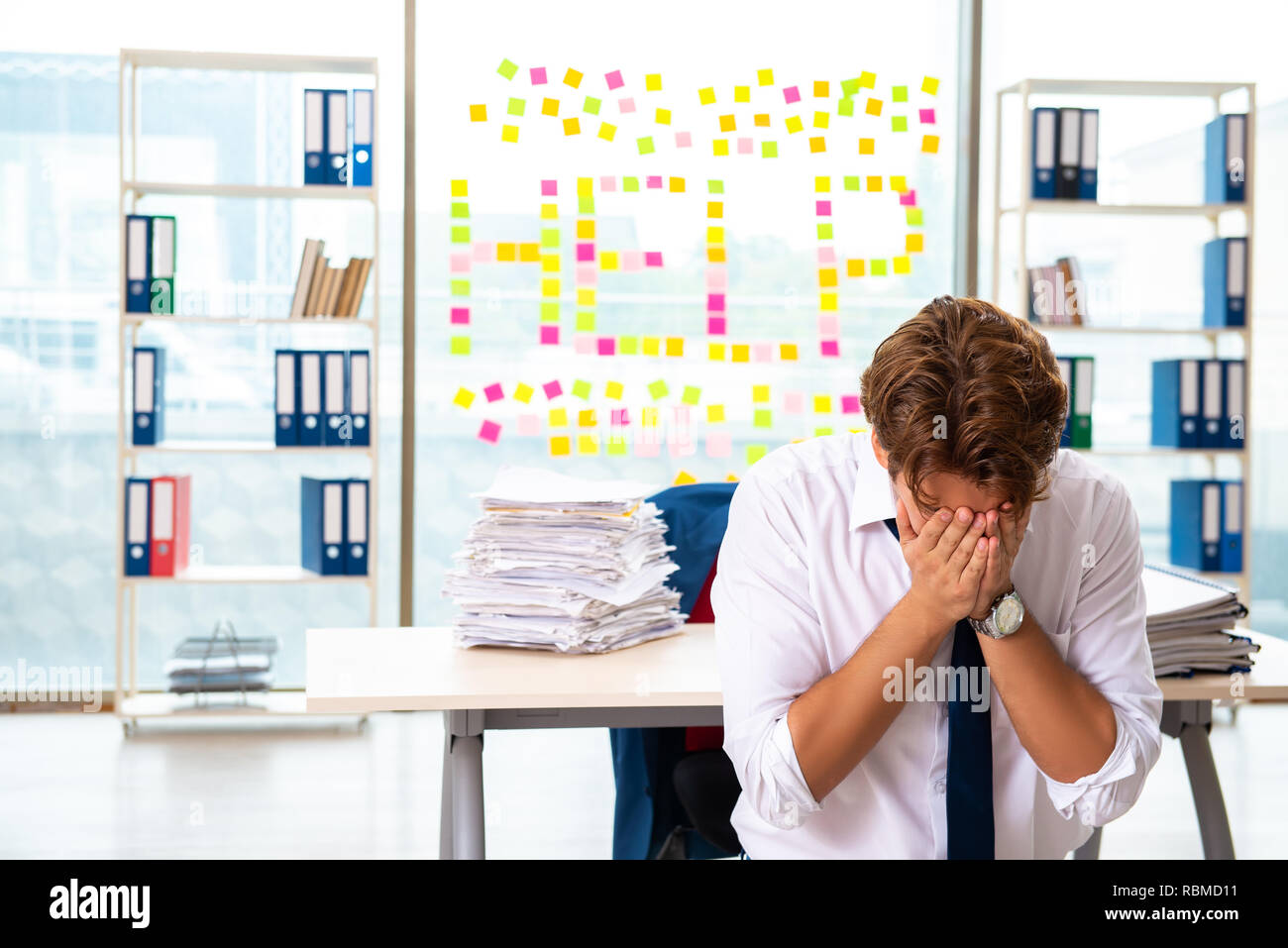 Busy businessman working in the office Stock Photo - Alamy