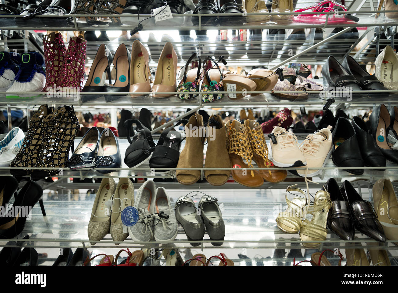 Womens Shoes on a rack Stock Photo - Alamy