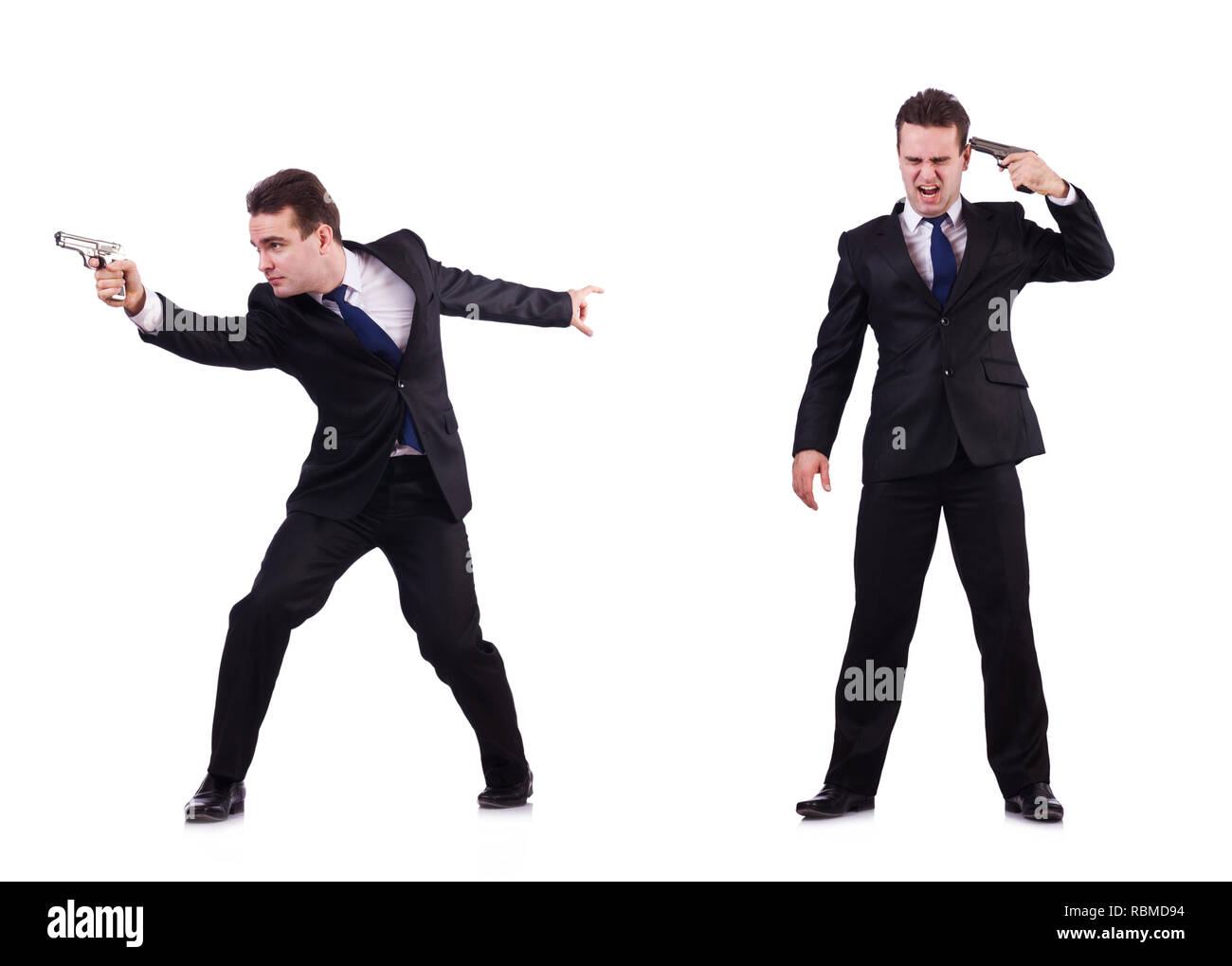 Man in suit with gun isolated on white Stock Photo - Alamy