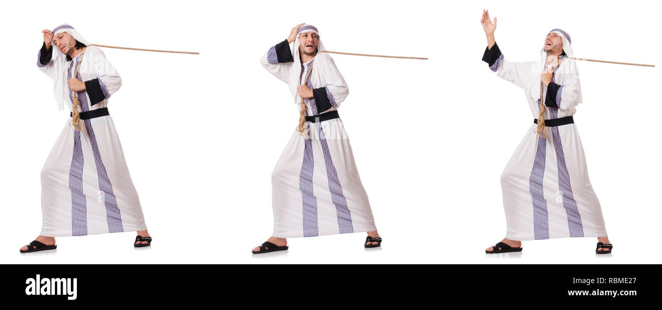 Arab man pulling rope in tug of war concept Stock Photo - Alamy