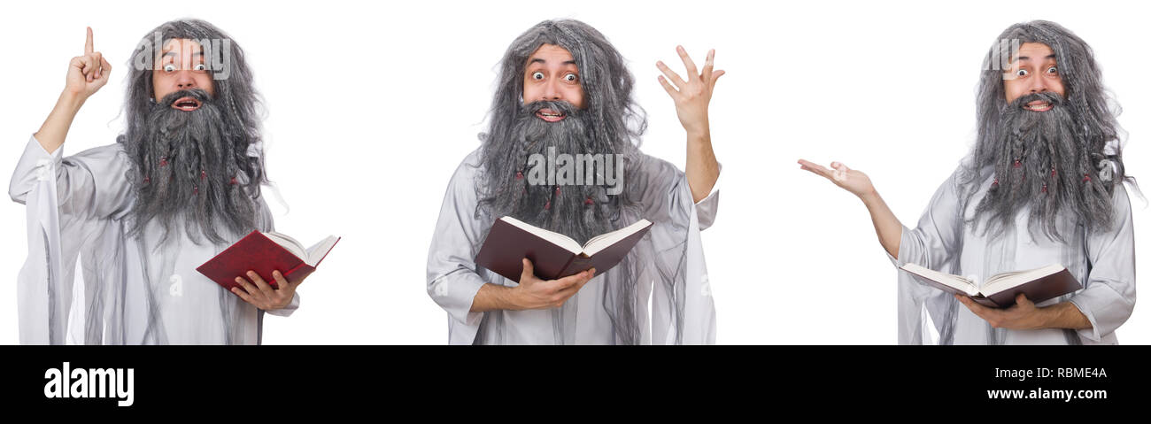 Funny old wizard with book Stock Photo - Alamy