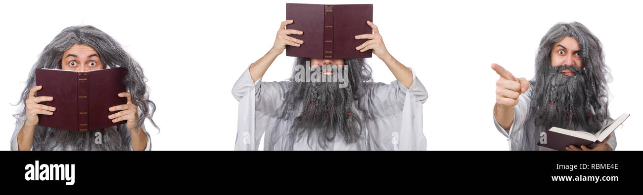 Funny old wizard with book Stock Photo - Alamy