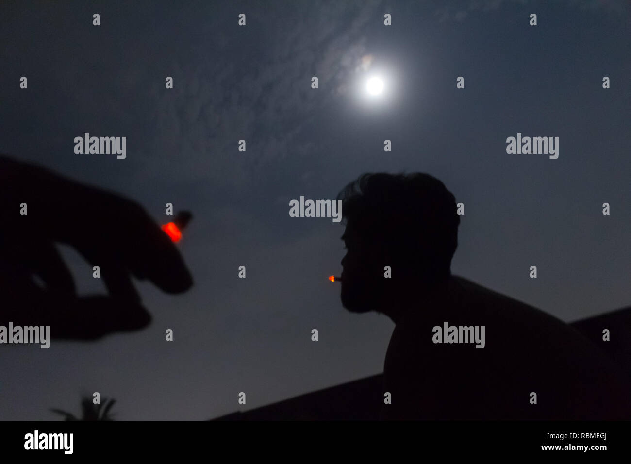 Man Smoking At Night High Resolution Stock Photography and Images - Alamy