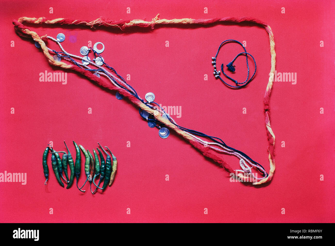 Symbols of superstition on red background Stock Photo - Alamy