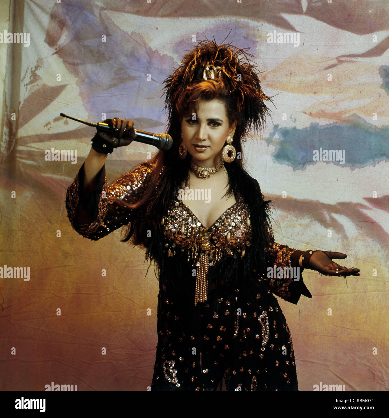 Not celebrity woman holding microphone hi-res stock photography and ...