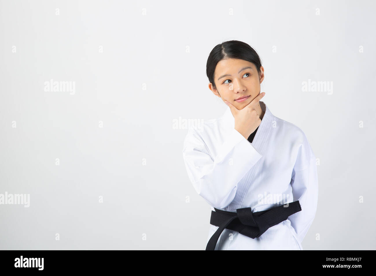 Putting hand on chin hi-res stock photography and images - Alamy