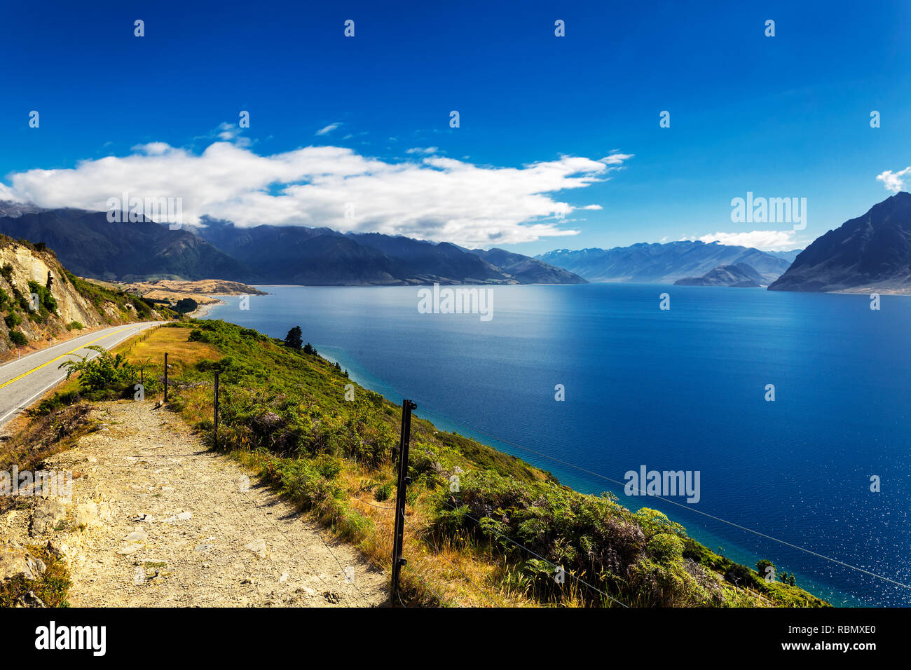 Blue lake Hawea view on a summer sunny day, South Island, New Zealand ...