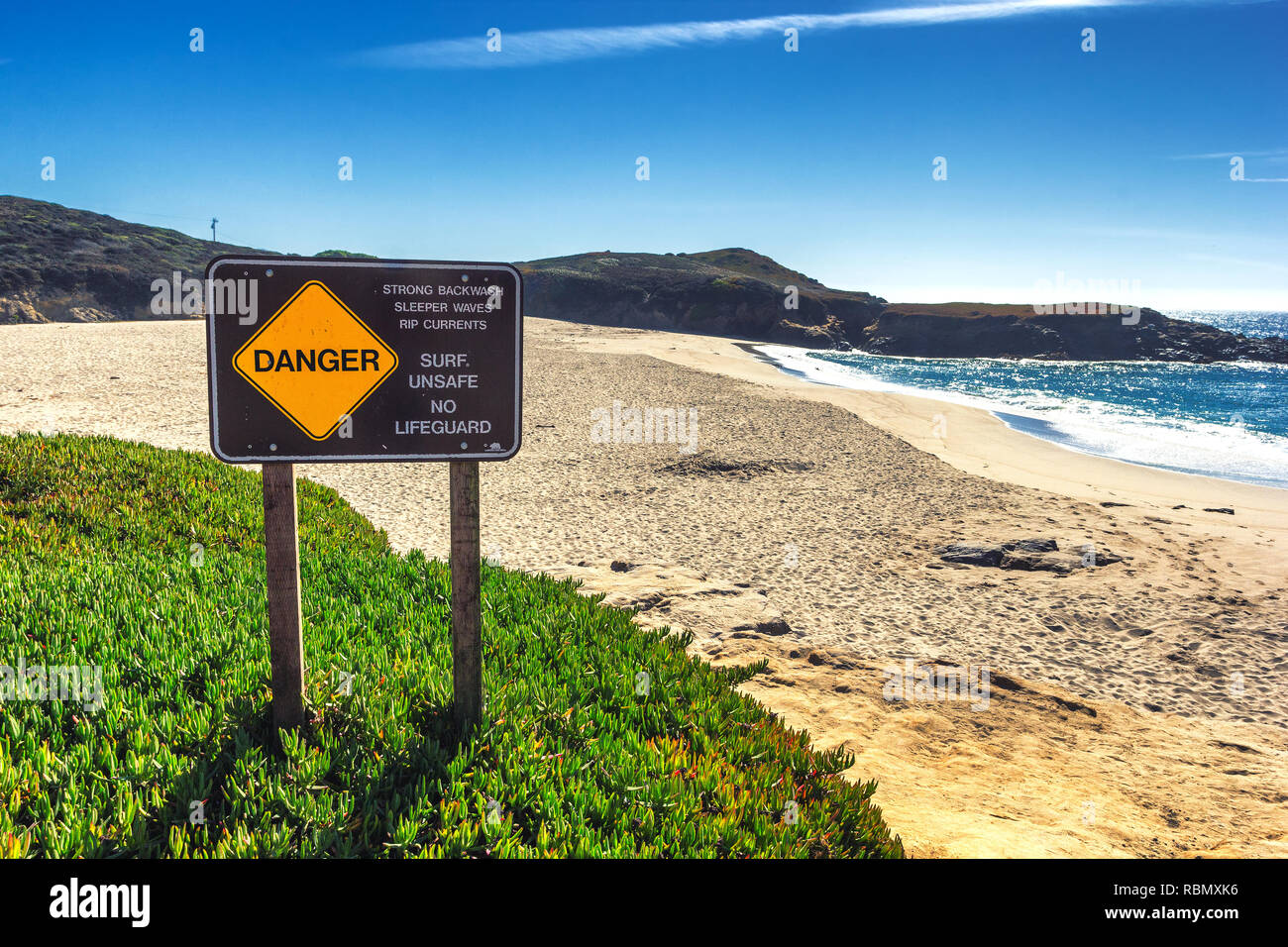 Warning danger sign for surfers in California, USA Stock Photo - Alamy